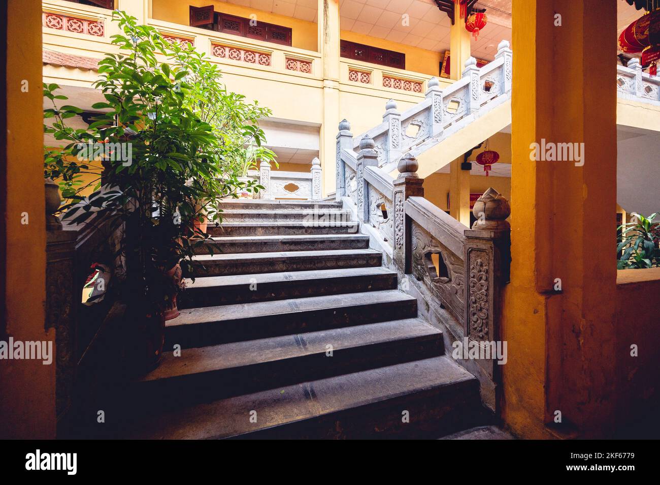 A view of a staircase inside the Buddhist temple Stock Photo - Alamy