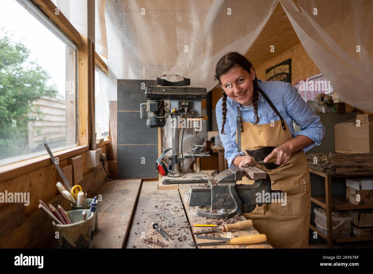 Rosie Brewer, wood carver artist Stock Photo - Alamy