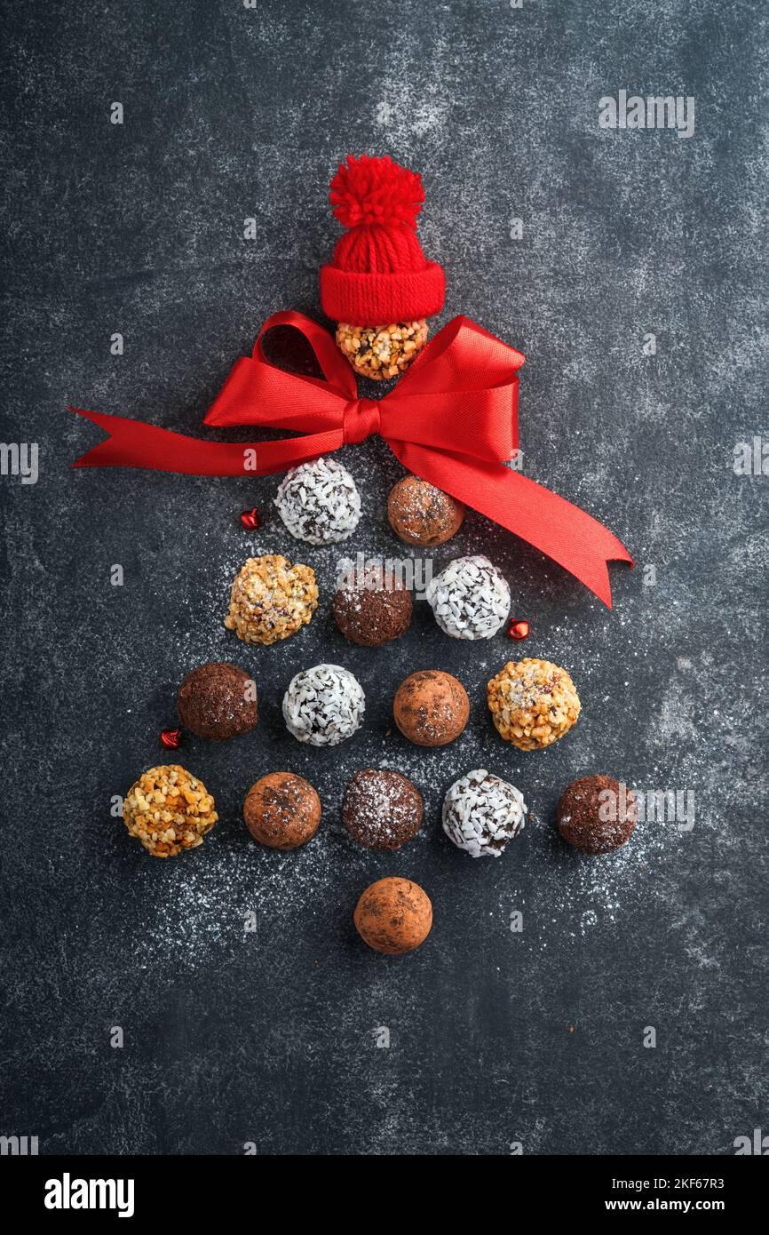 Christmas tree made of chocolate truffles, hazelnuts, anise stars ...