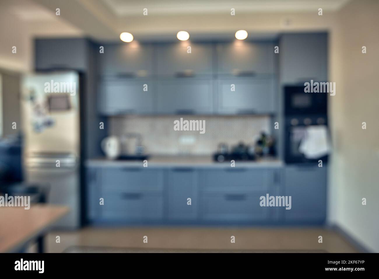 blurred image of modern kitchen interior for background Stock Photo - Alamy