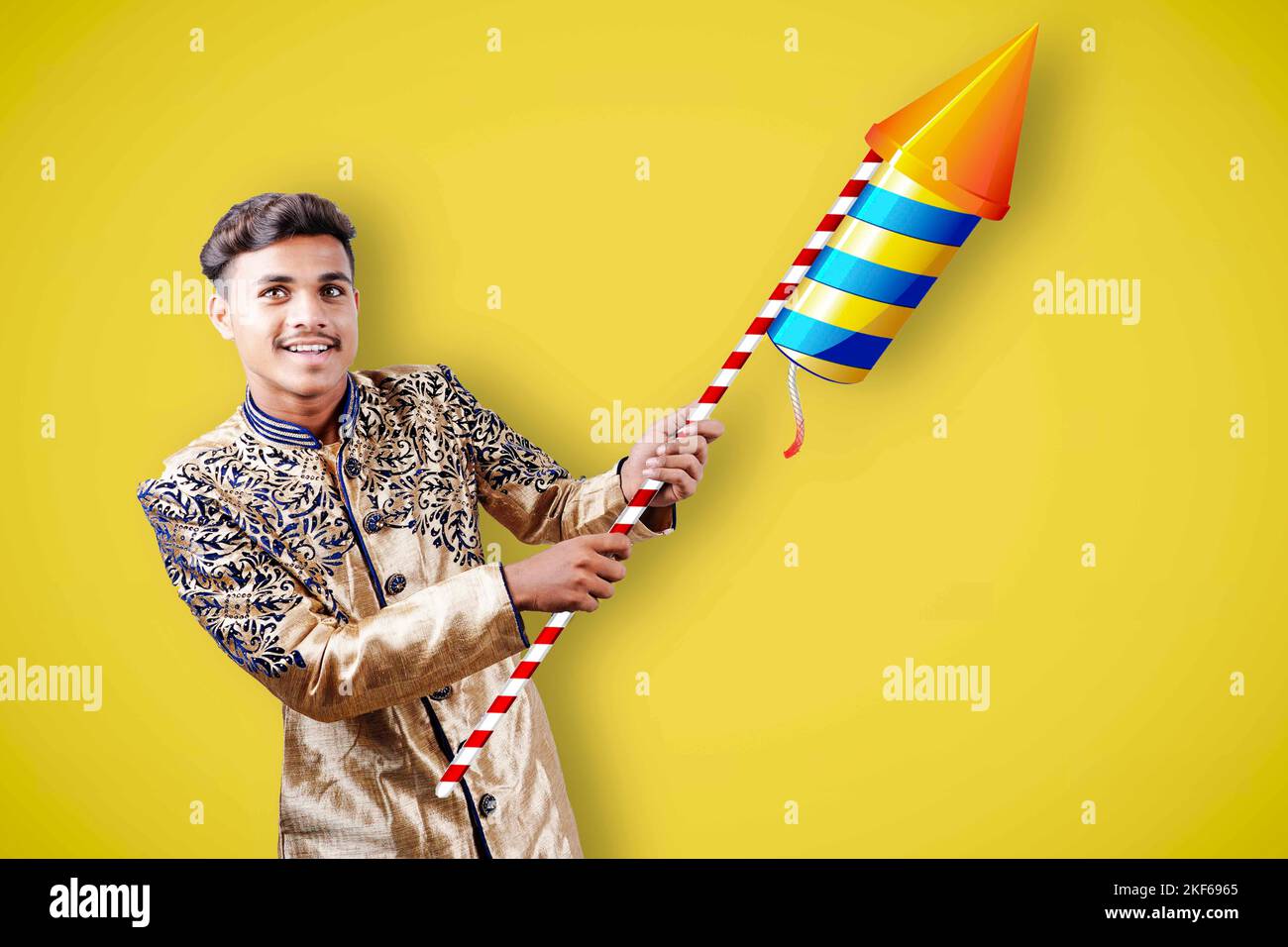 Indian man holding firecrackers in his hands, indian festival concepts ...