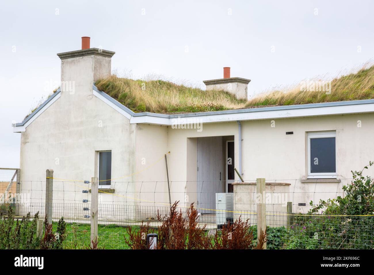 Remote bungalow with a soil and grass roof, Orkney, Scotland, UK, 2022 ...