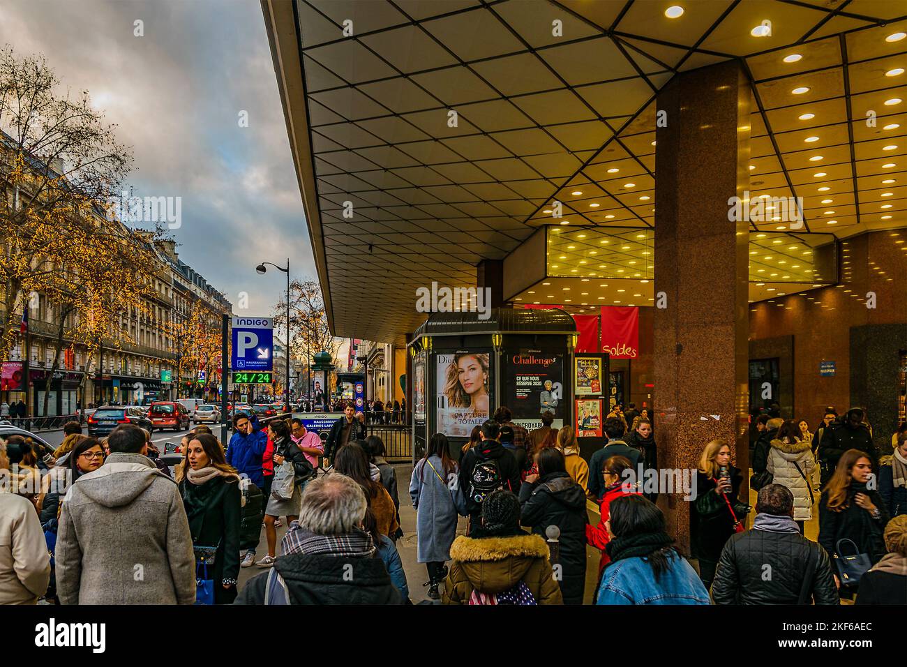 PARIS, FRANCE, JANUARY - 2020 - Long shot urban scene crowd walking at ...