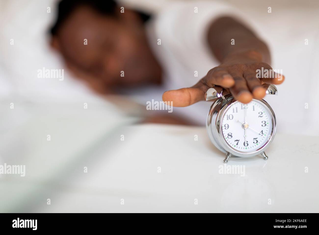 Turning off alarm clock hi-res stock photography and images - Alamy