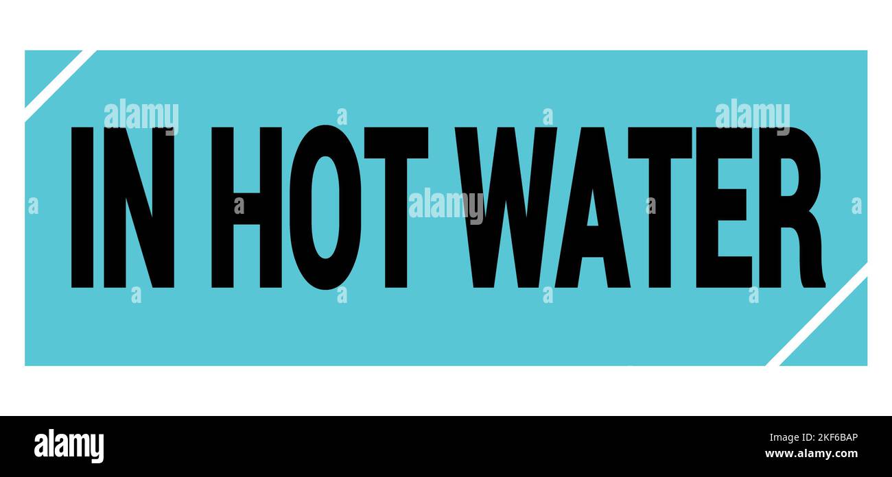 IN HOT WATER text written on blue-black grungy stamp sign Stock Photo ...