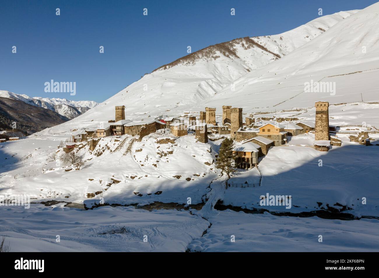 Traditional ancient Svan Towers and machub house in Ushguli village ...