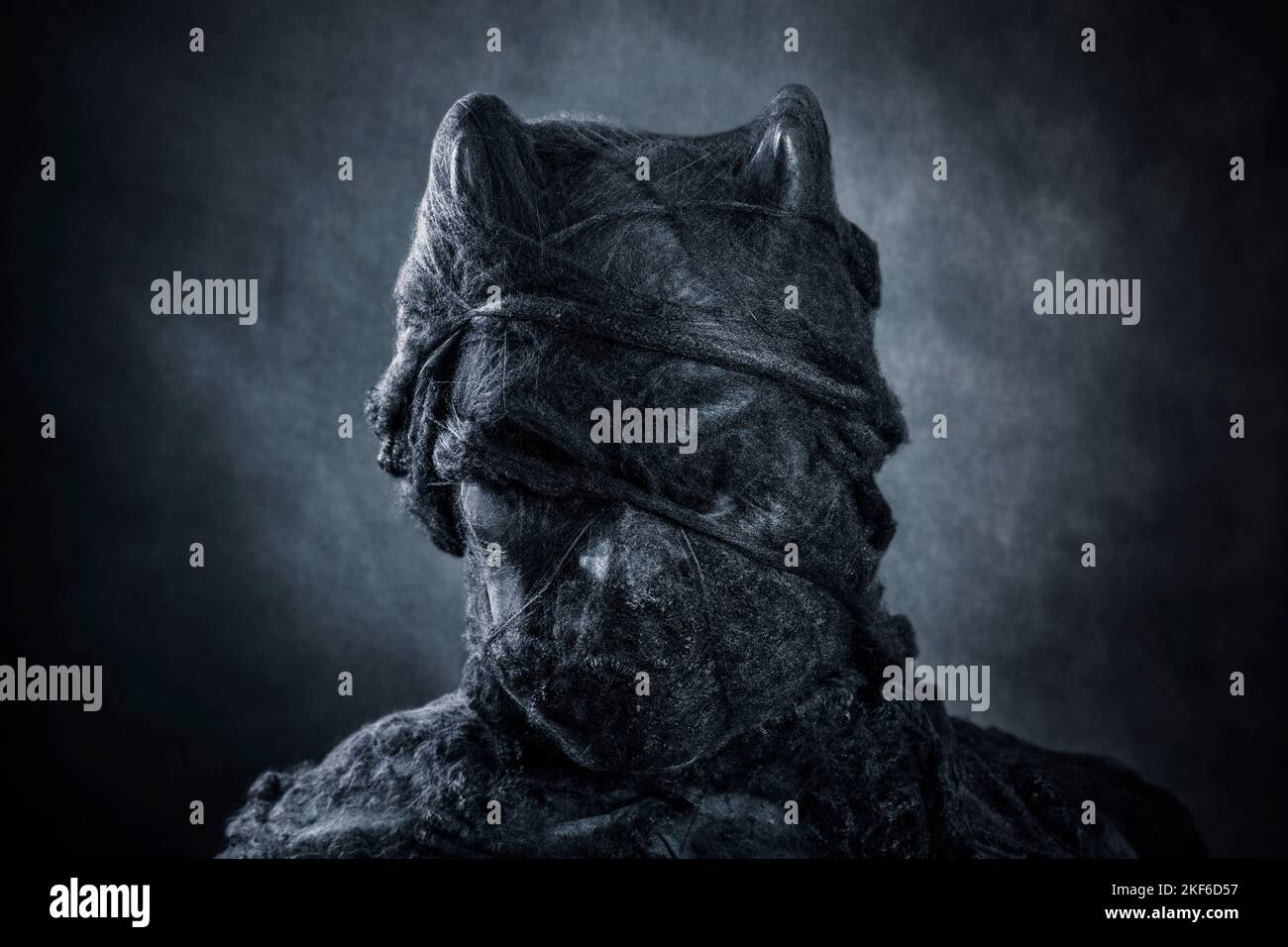 Portrait of a horned demon on dark misty background Stock Photo - Alamy
