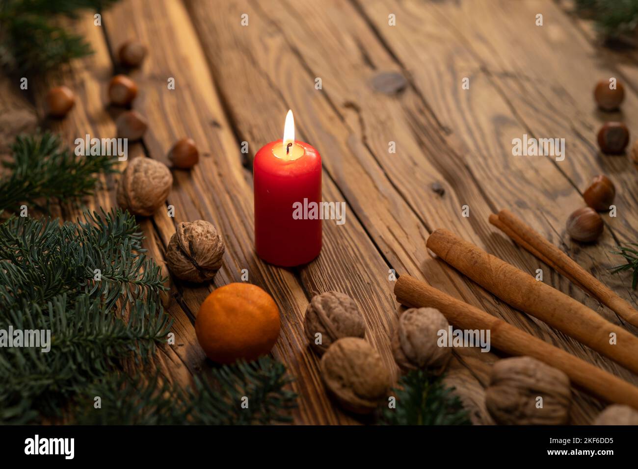 Traditional Czech Christmas on wood decoration with twig, candle, apple ...