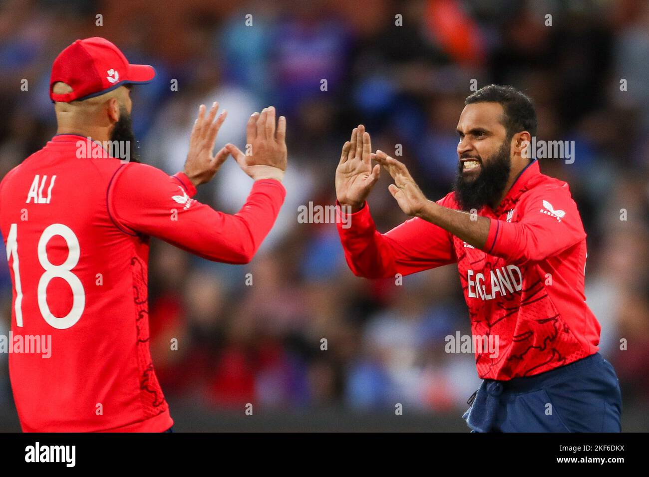 File photo dated 10-11-2022 of England's Adil Rashid (right) Sam Curran ...