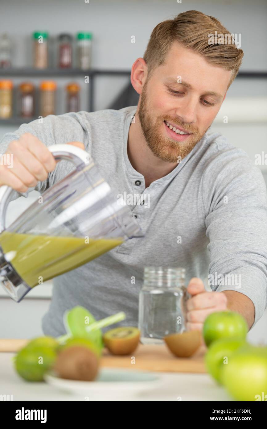Man pouring apple glass hi-res stock photography and images - Alamy