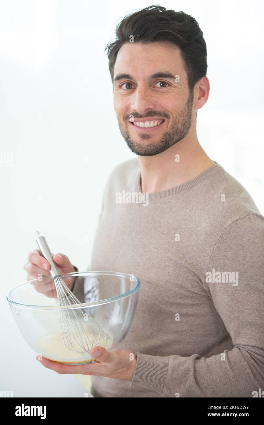 Man making breakfast hi-res stock photography and images - Alamy
