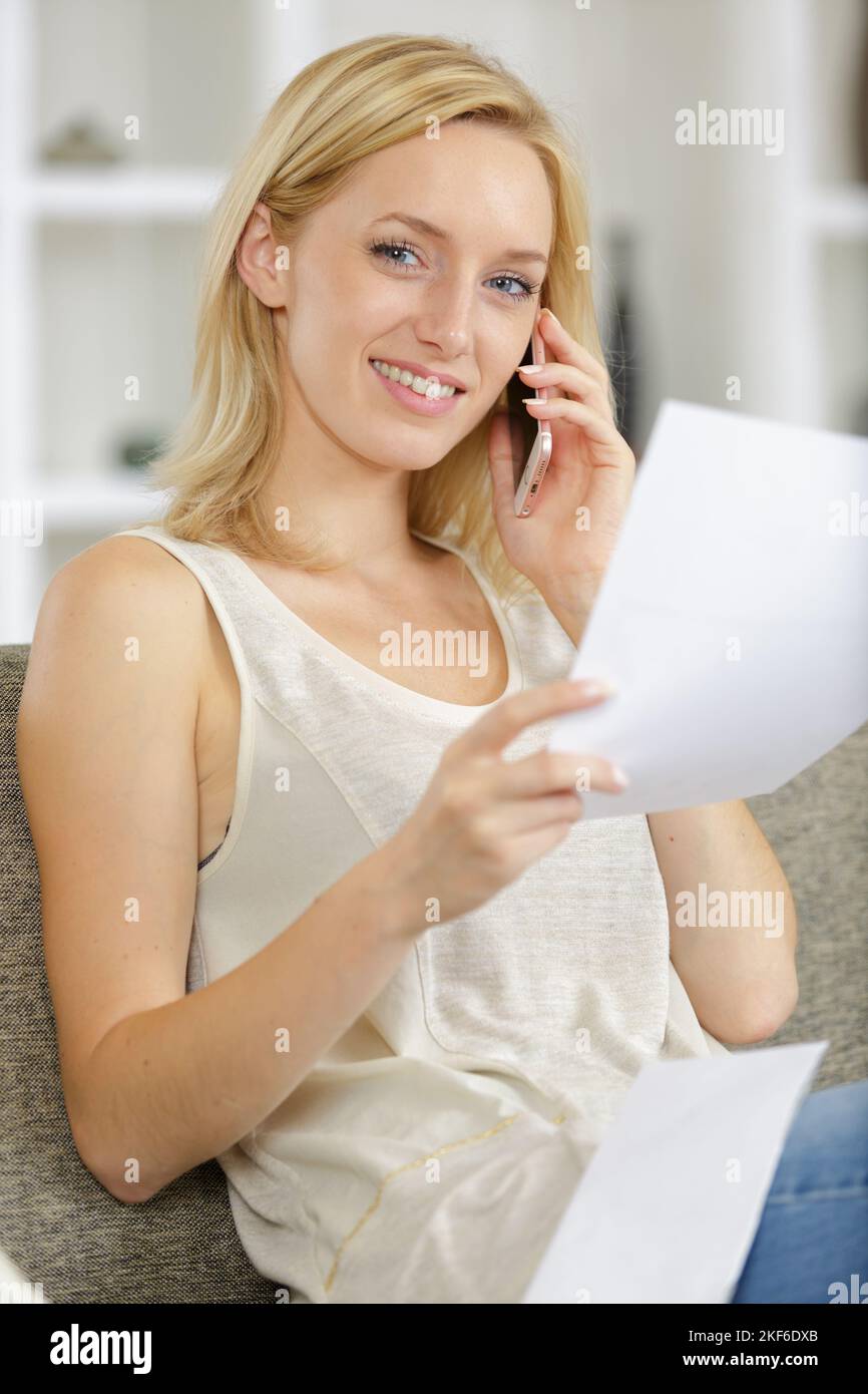 shot of beautiful young using her mobile phone Stock Photo - Alamy