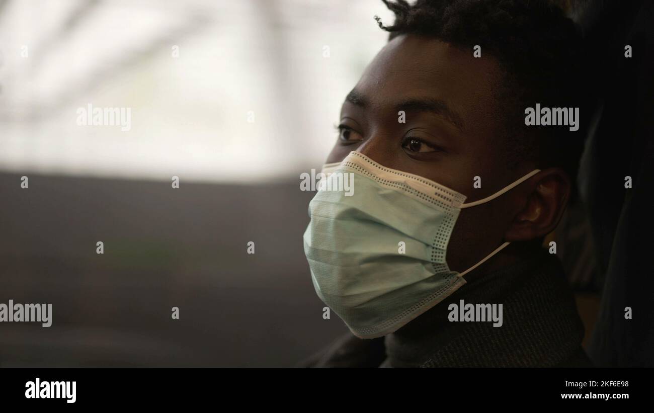 Commuter person wearing covid face mask at subway metro Stock Photo - Alamy