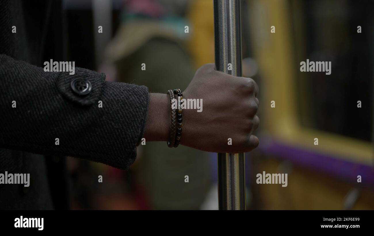He is holding on to plastic handgrip hi-res stock photography and ...