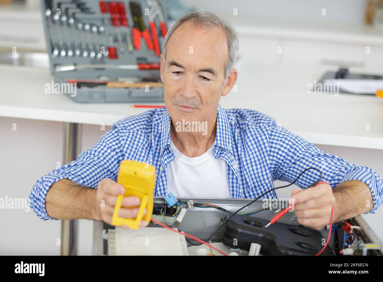 Technician using multimeter hi-res stock photography and images - Alamy
