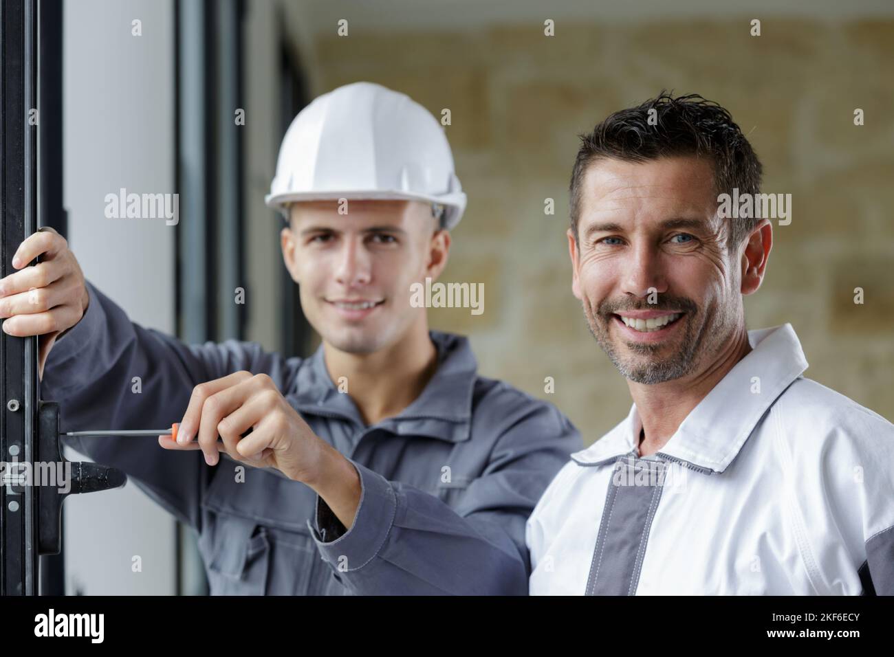 apprentice having a pvc installation lesson Stock Photo - Alamy
