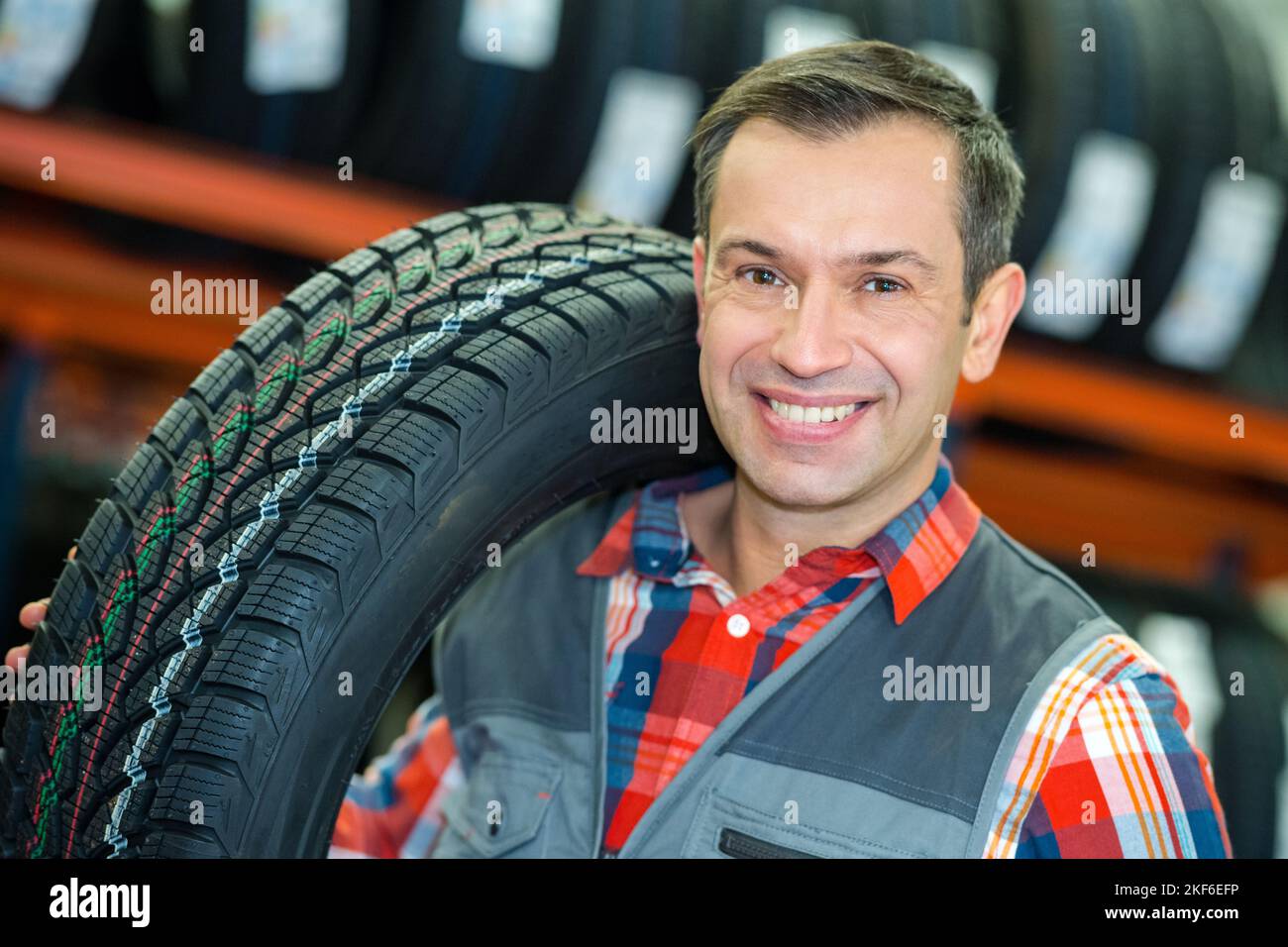 Holding tyre hi-res stock photography and images - Alamy