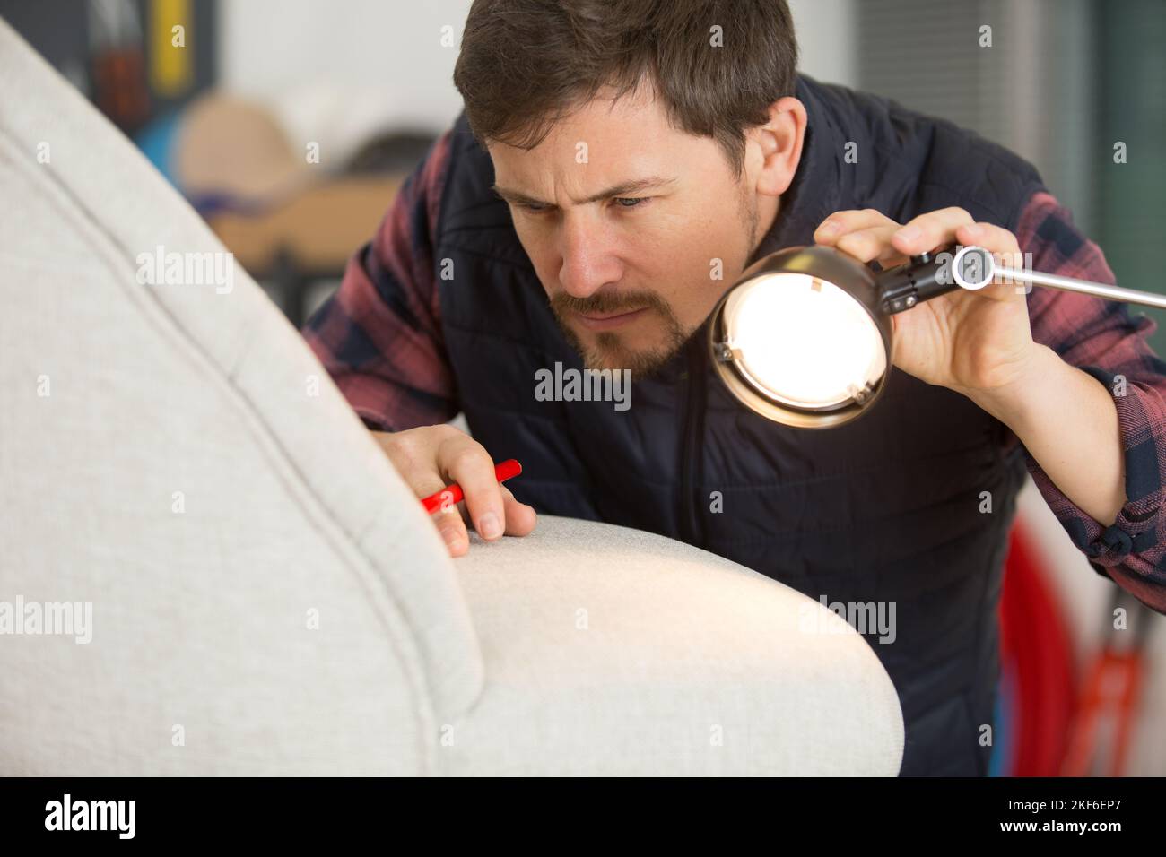 Man repair armchair hi-res stock photography and images - Alamy