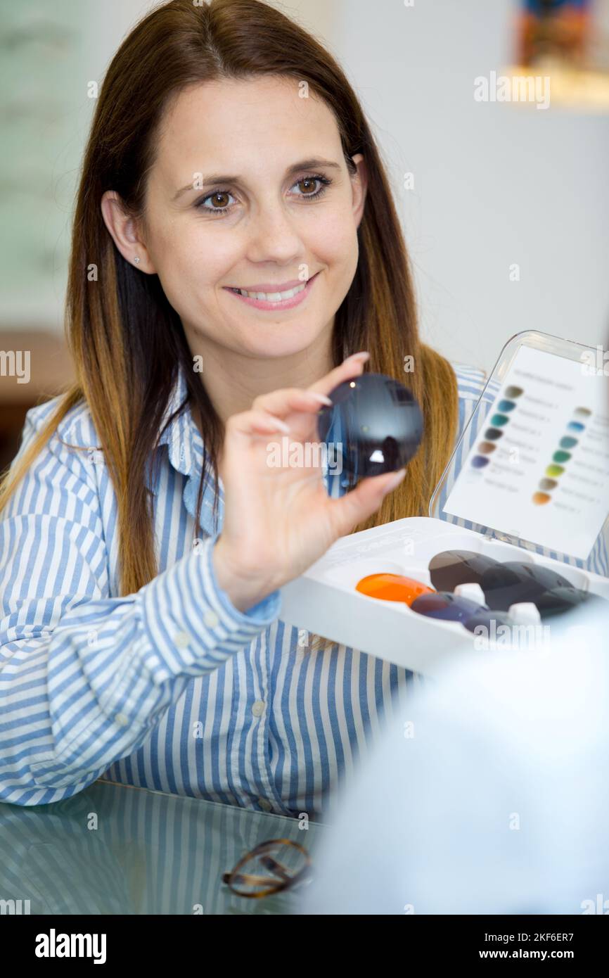 female worker in optical store Stock Photo - Alamy