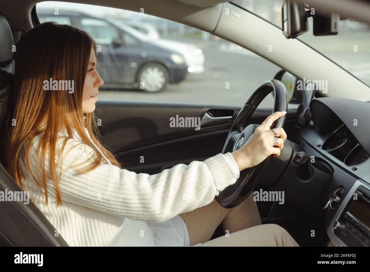 Side view relaxed woman driving car, rent carshering concept. Sales ...
