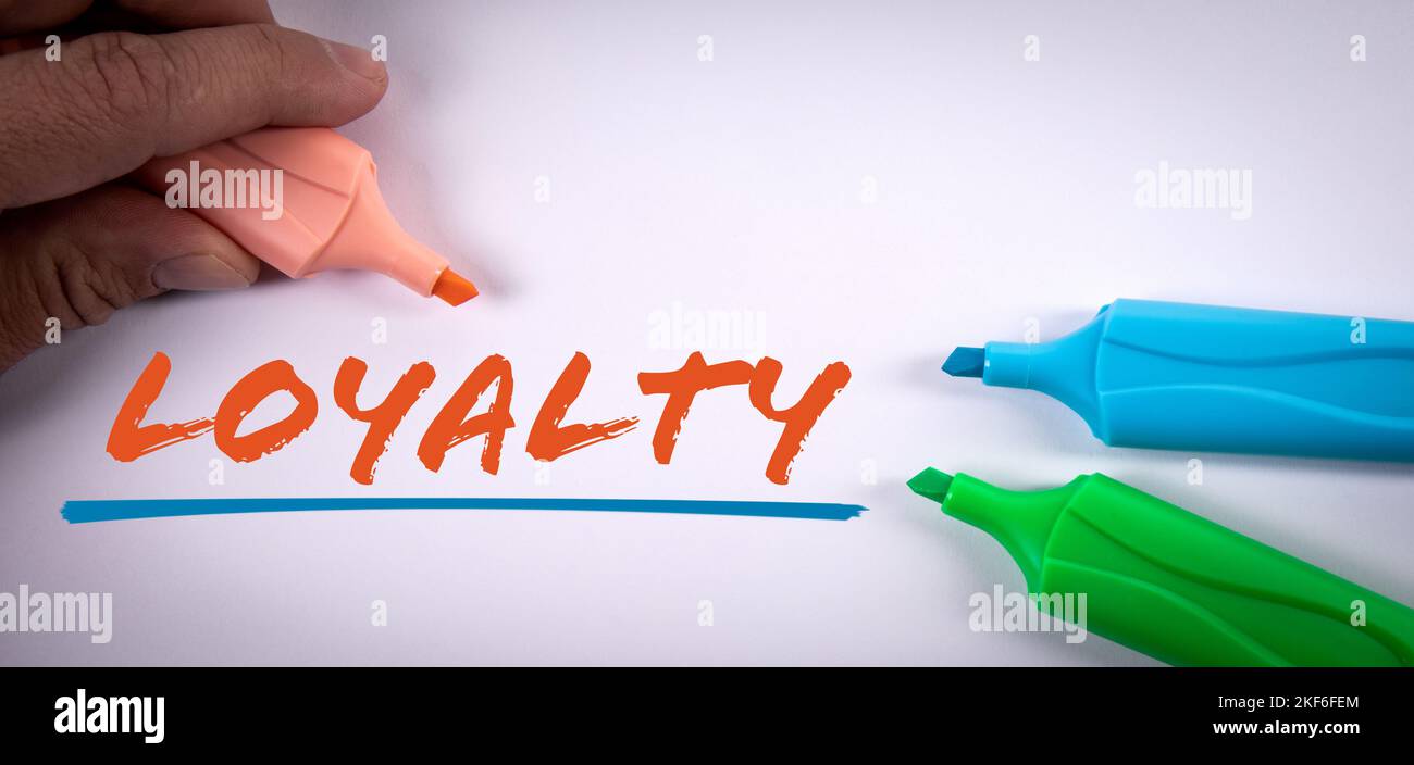 LOYALTY CONCEPT. Text and colored markers on a white background Stock ...