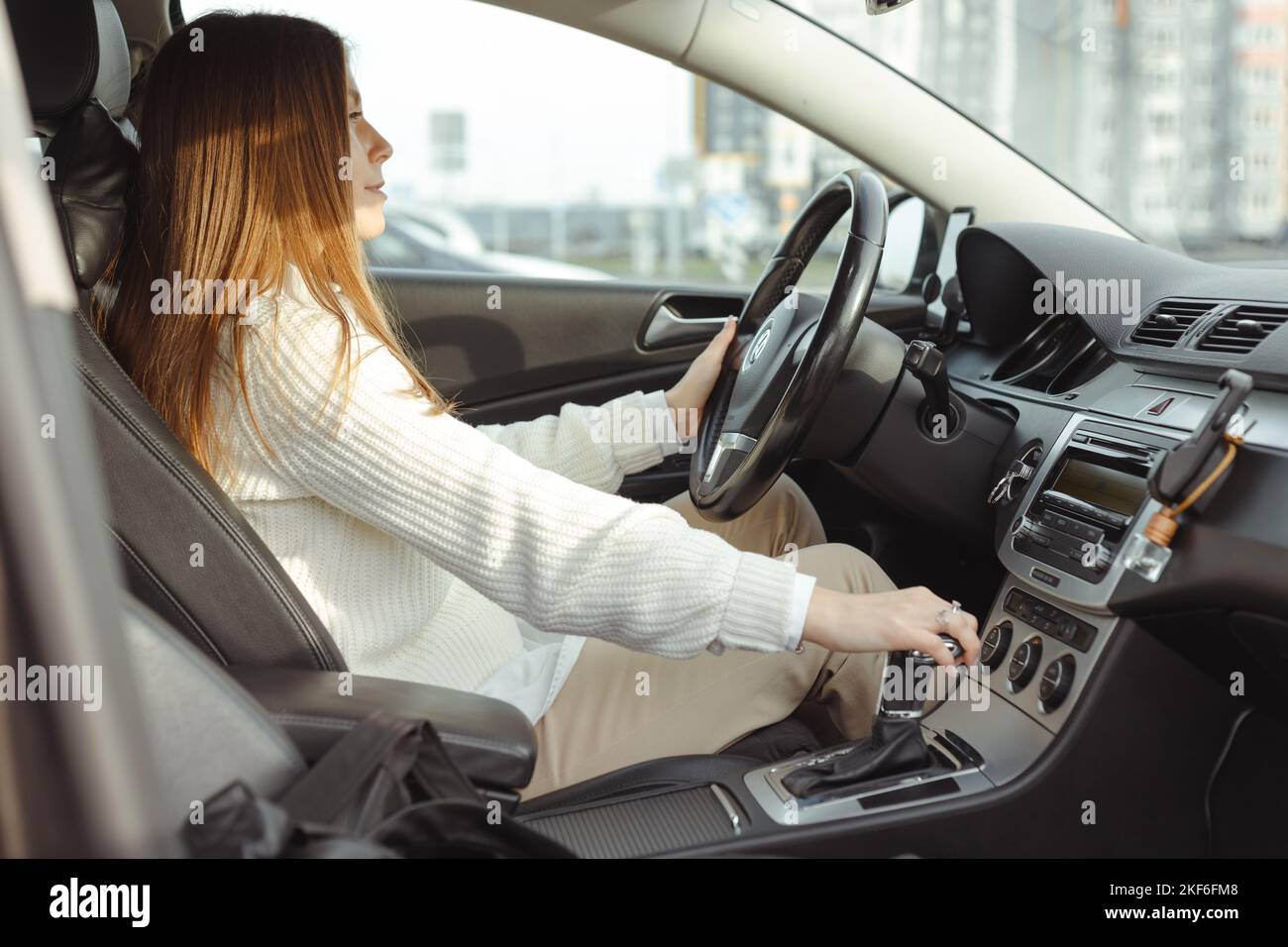Side view relaxed woman driving car, rent carshering concept. Sales ...