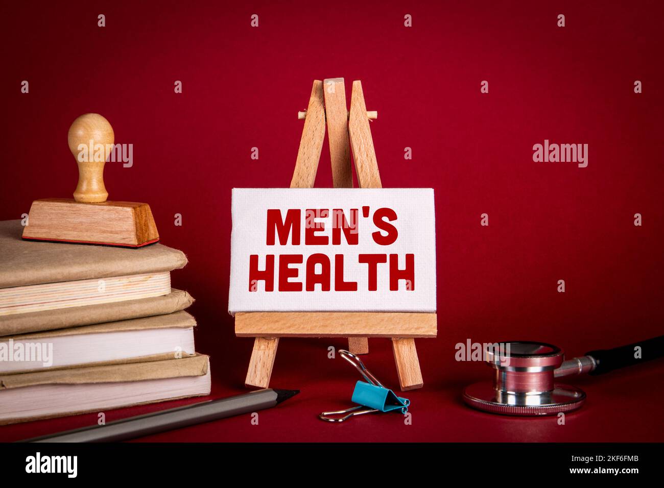 Men's Health. Miniature easel with text on doctor's desk Stock Photo ...