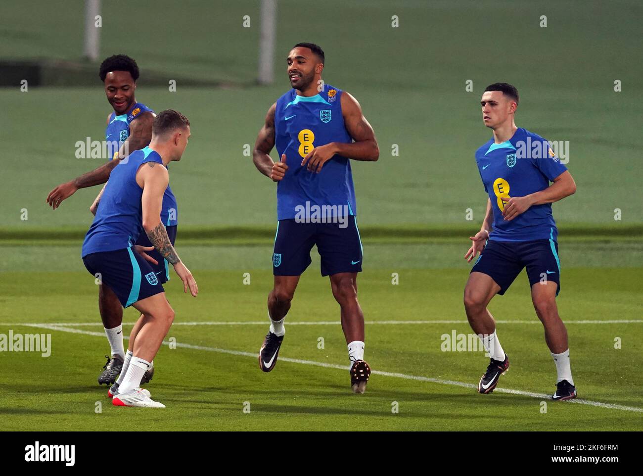 England's Callum Wilson (centre) with Phil Foden (right) during a ...