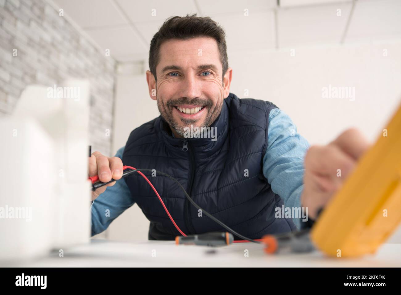 electrician working on residential electrical system Stock Photo - Alamy