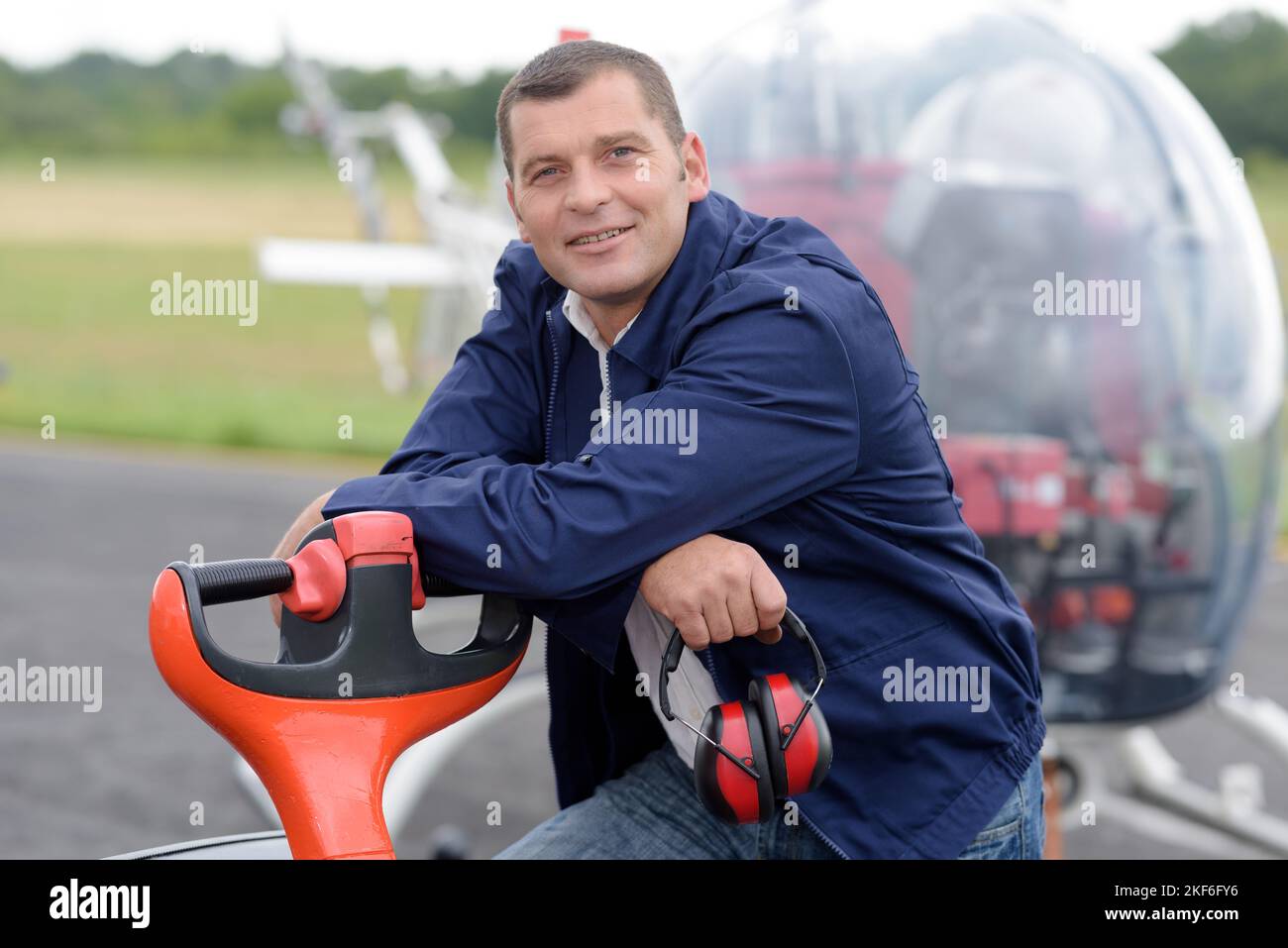 a man on helicopter deck offshore Stock Photo - Alamy
