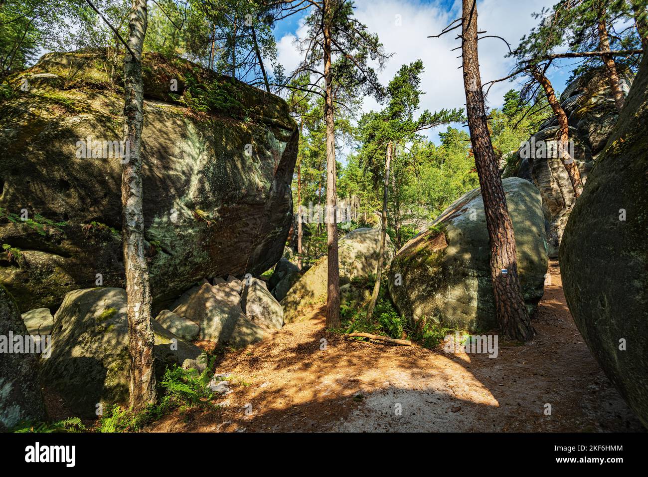 The romantic labyrinth of sandstone rocks lies above the left bank of ...