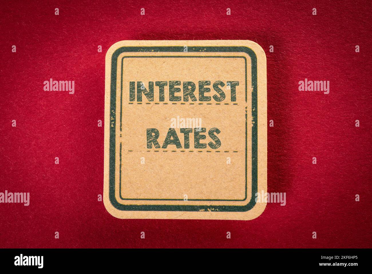 INTEREST RATES. Sticky note with text on a red background Stock Photo ...