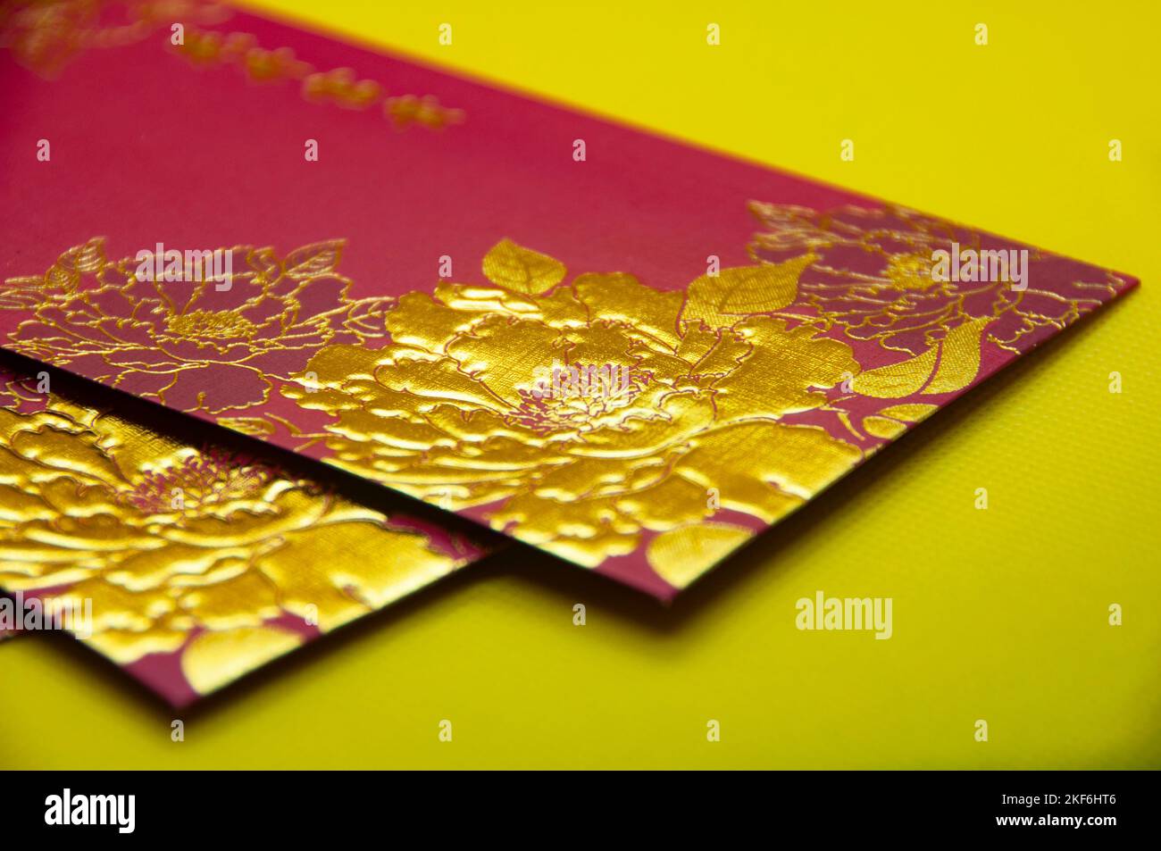 Chinese New Year golden red packets on yellow background. Chinese New ...