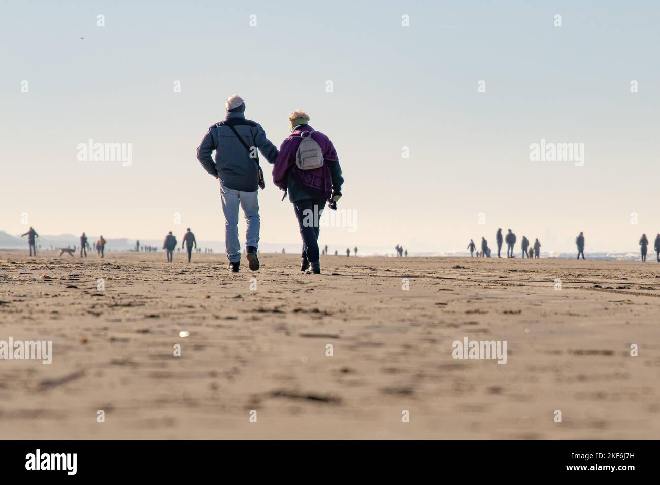 People walking on the beach in the winter at Noordwijk aan Zee Stock ...