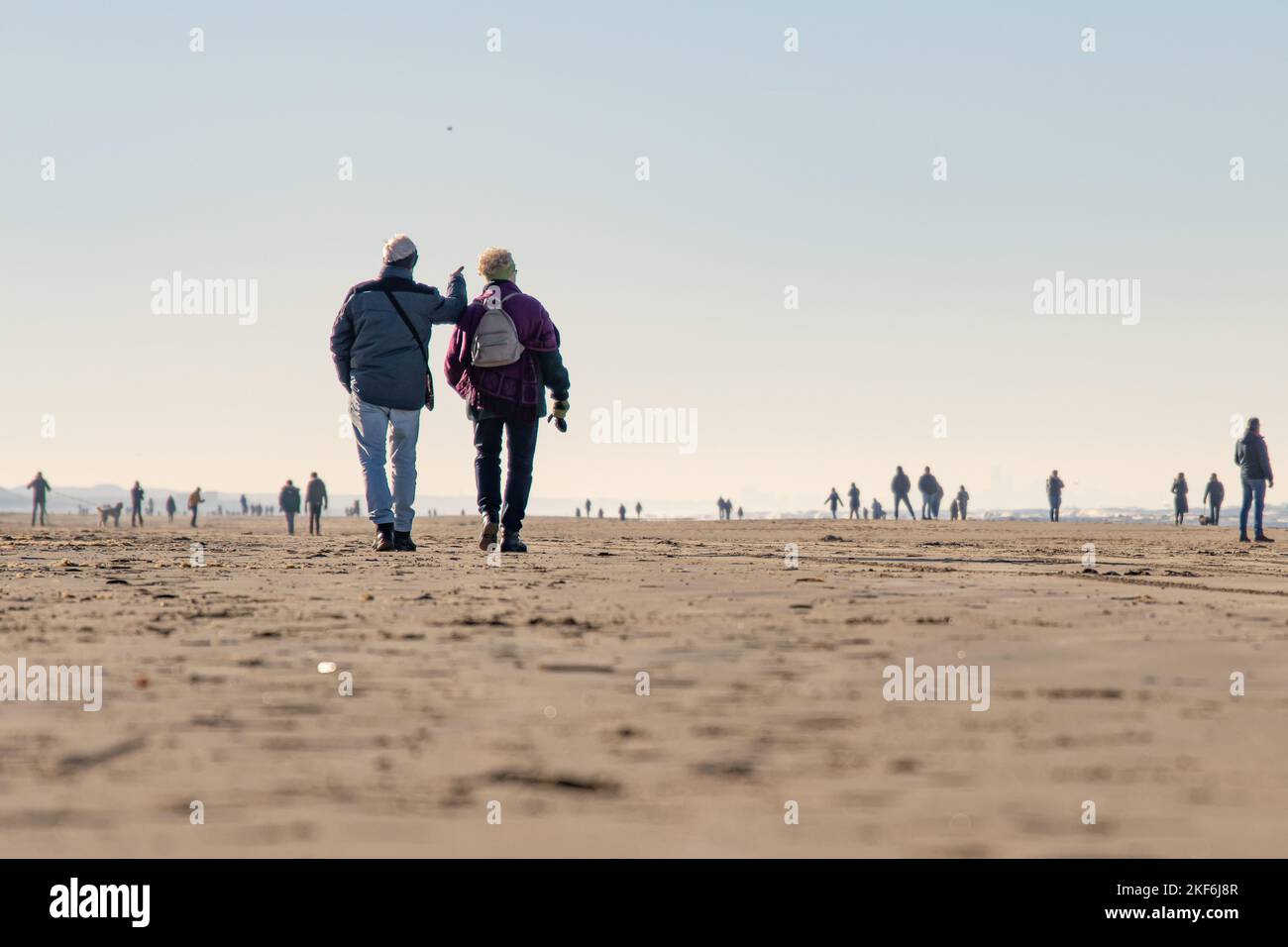 People walking on the beach in the winter at Noordwijk aan Zee Stock ...