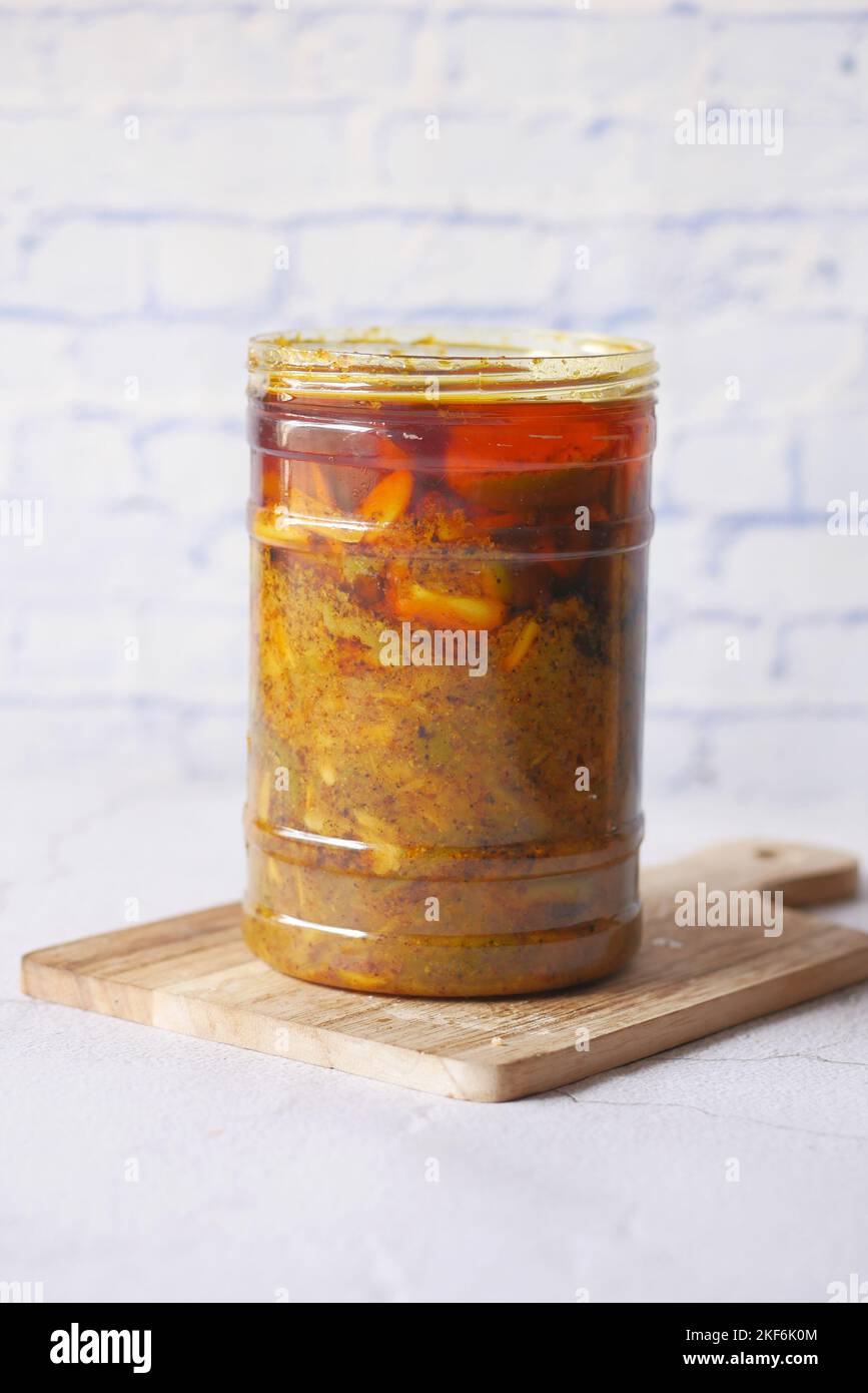 Homemade Mango Pickle in a glass jar on table Stock Photo - Alamy