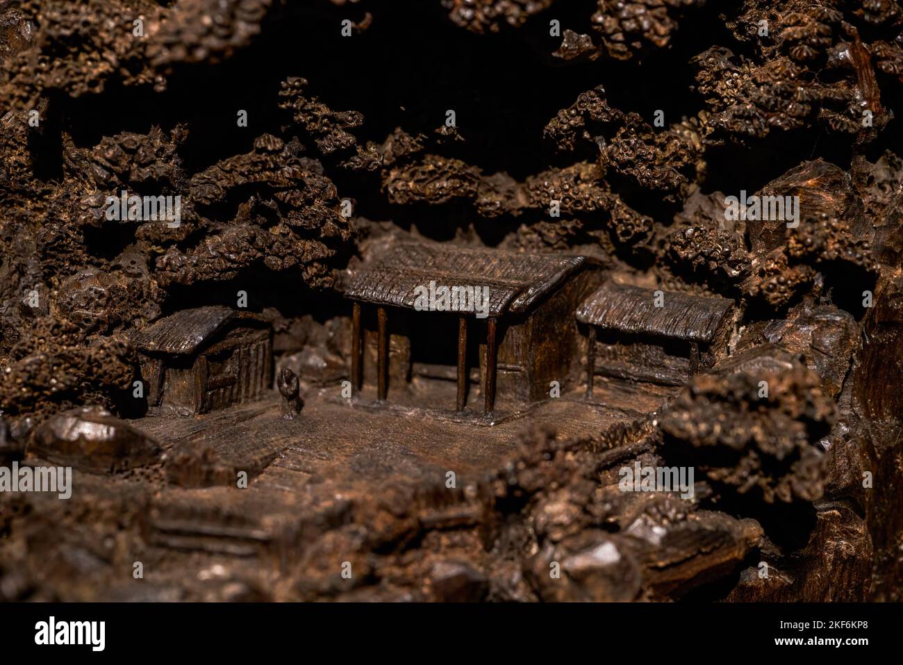 Close-up of delicate miniature wooden root carvings Stock Photo - Alamy