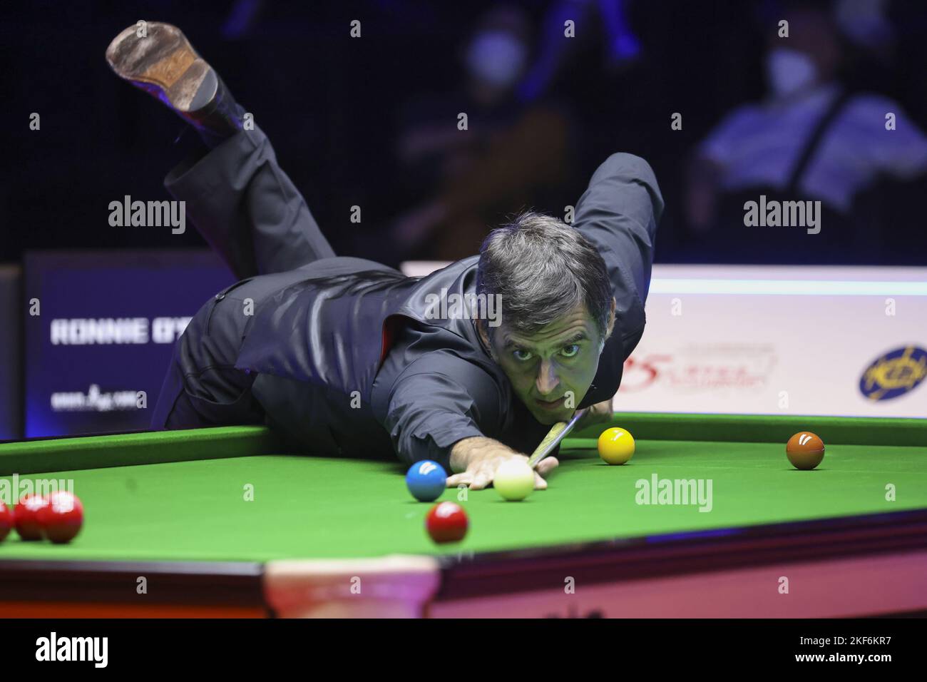 BritainHH Ronnie O'Sullivan plays a shot in the game against Hong KongHH Marco Fu Ka-chun during ...
