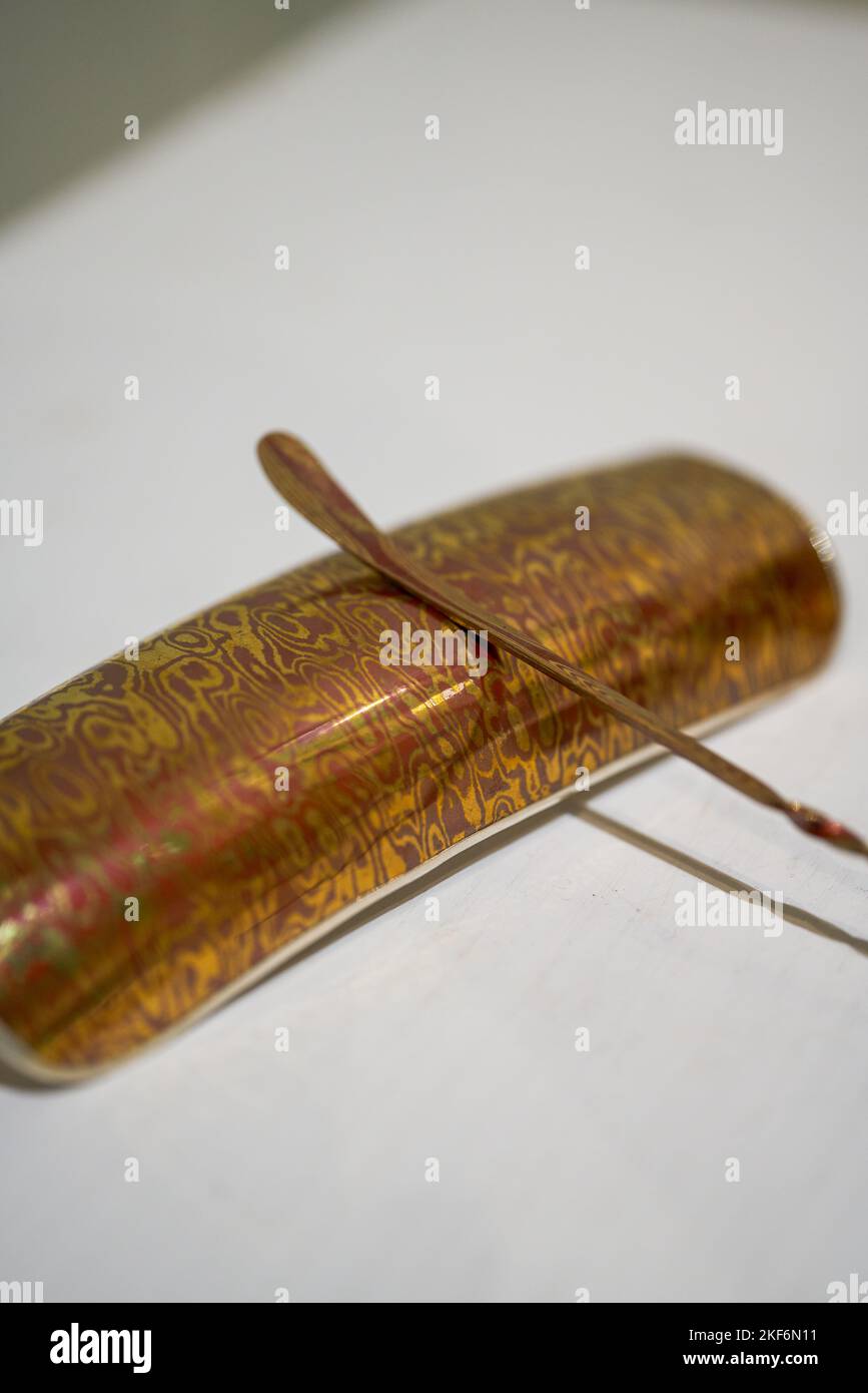 A fine metal ear pick close-up Stock Photo - Alamy