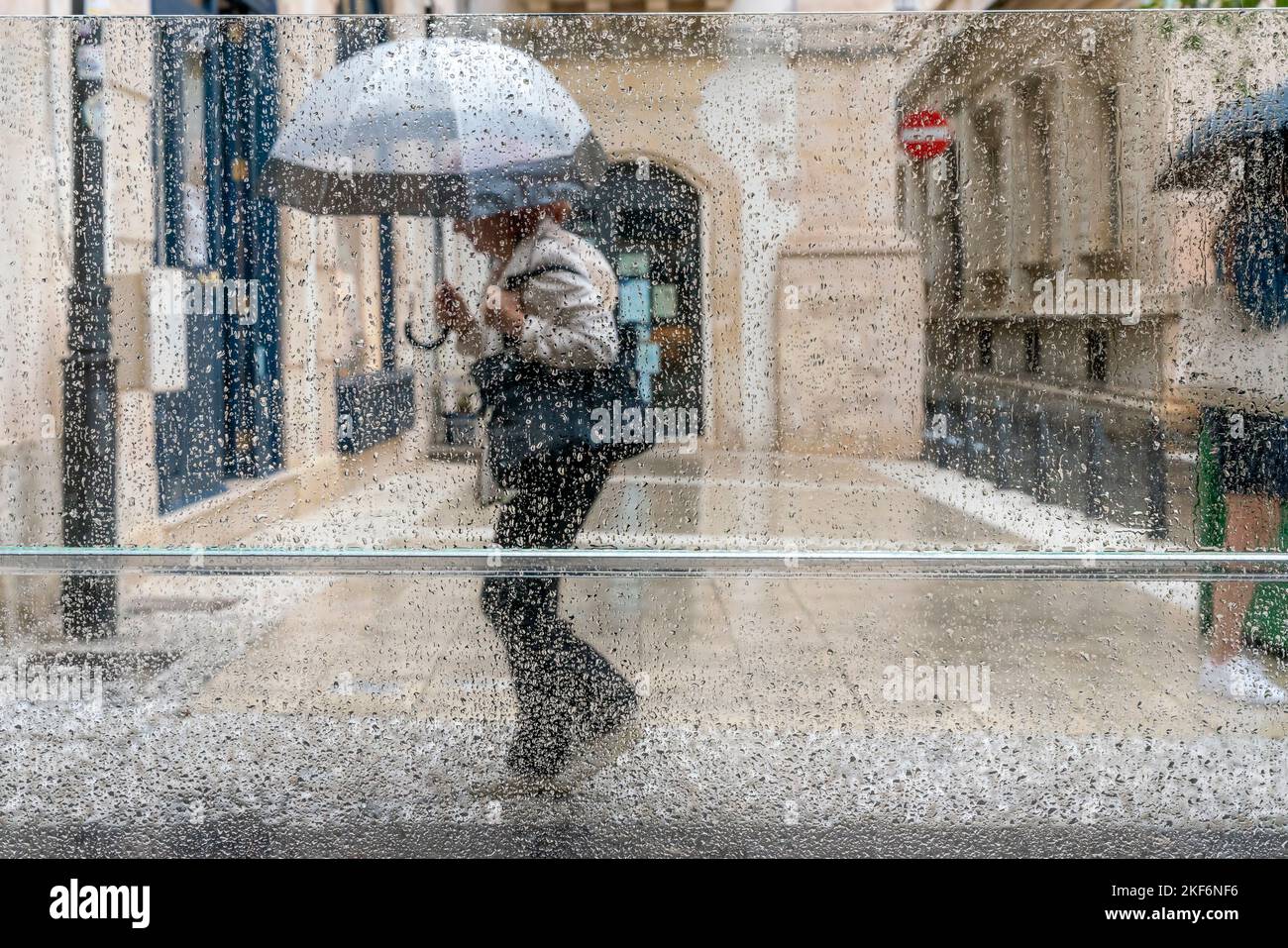 People Walking In The Street During Heavy Rain, Ortigia, Syracuse ...