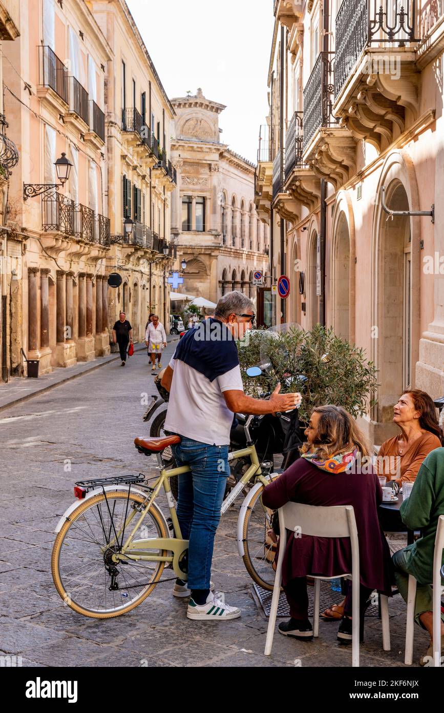 Local People Chatting With The Teatro Comunale Building At The Far End ...