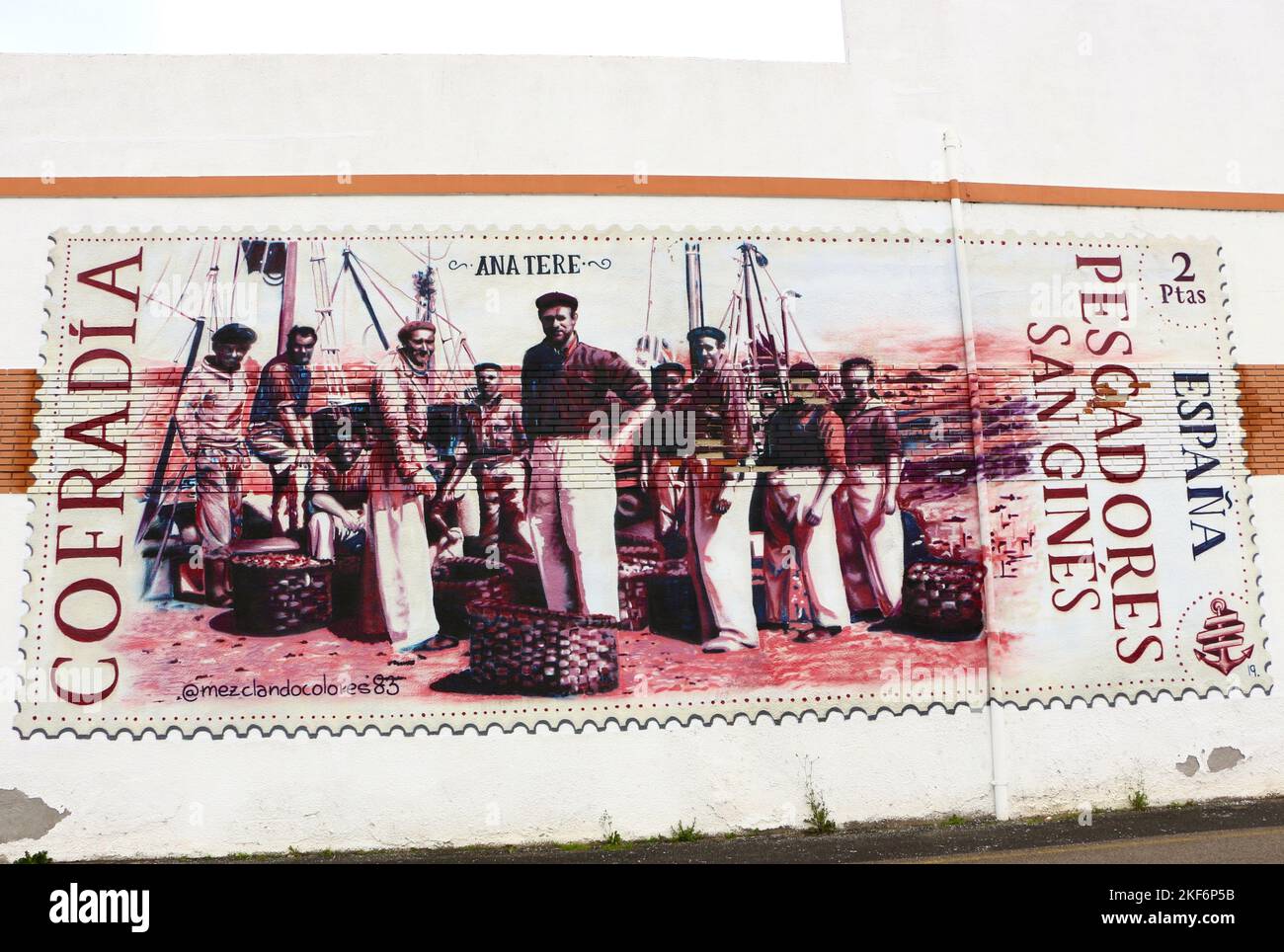 Painted large postage stamp on a warehouse wall Cofradía de pescadores ...