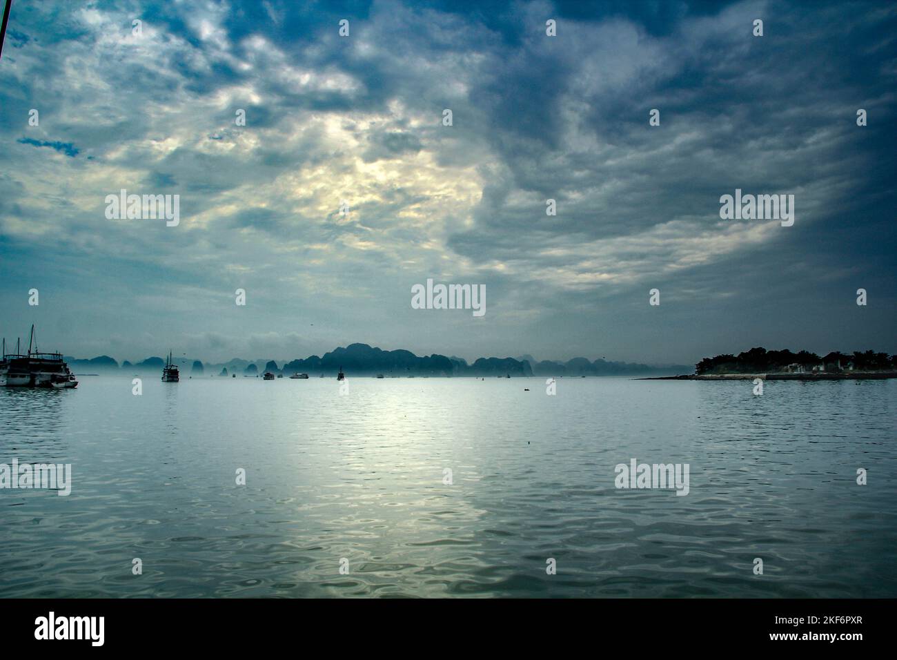 Halong Bay, Vietnam. Scenic view of rock islands and sailboats in the ...