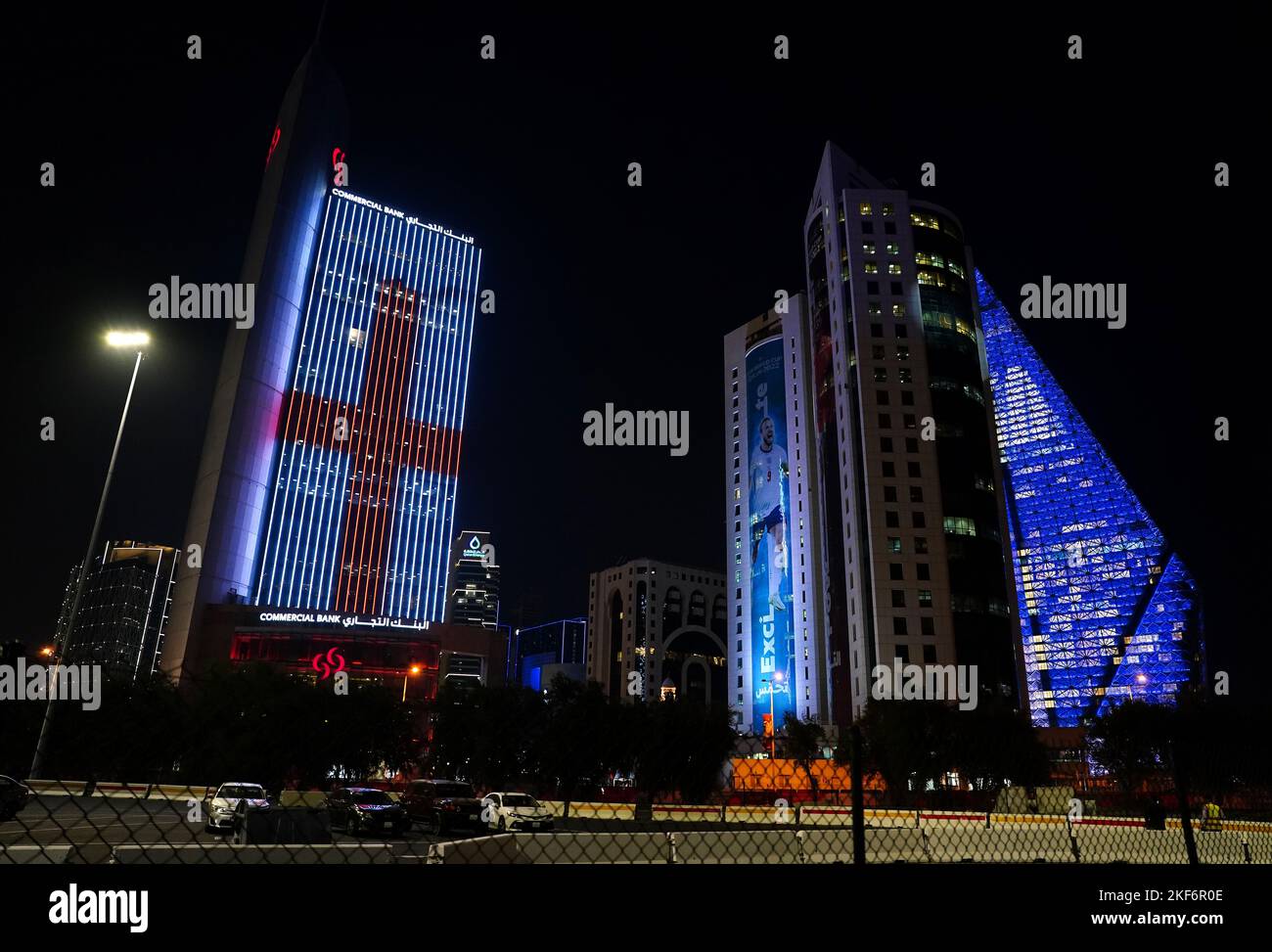 A general view of the Doha skyline featuring a building with an England ...
