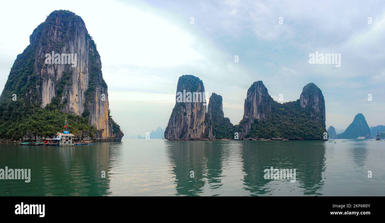 Halong Bay, Vietnam. Scenic view of rock islands and sailboats in the ...