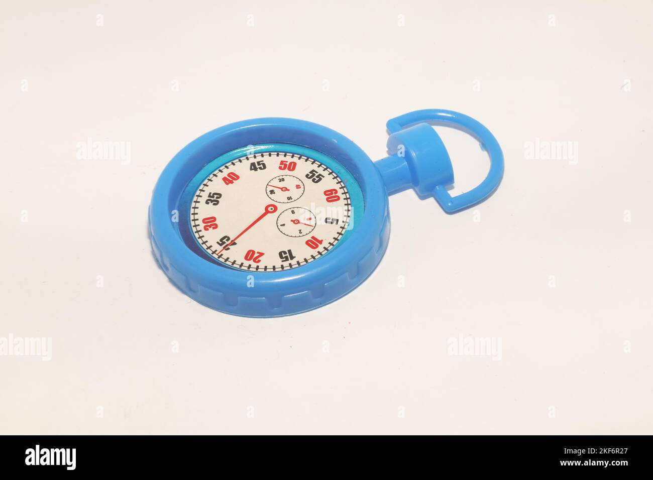 Blue toy stopwatch on a white background Stock Photo - Alamy