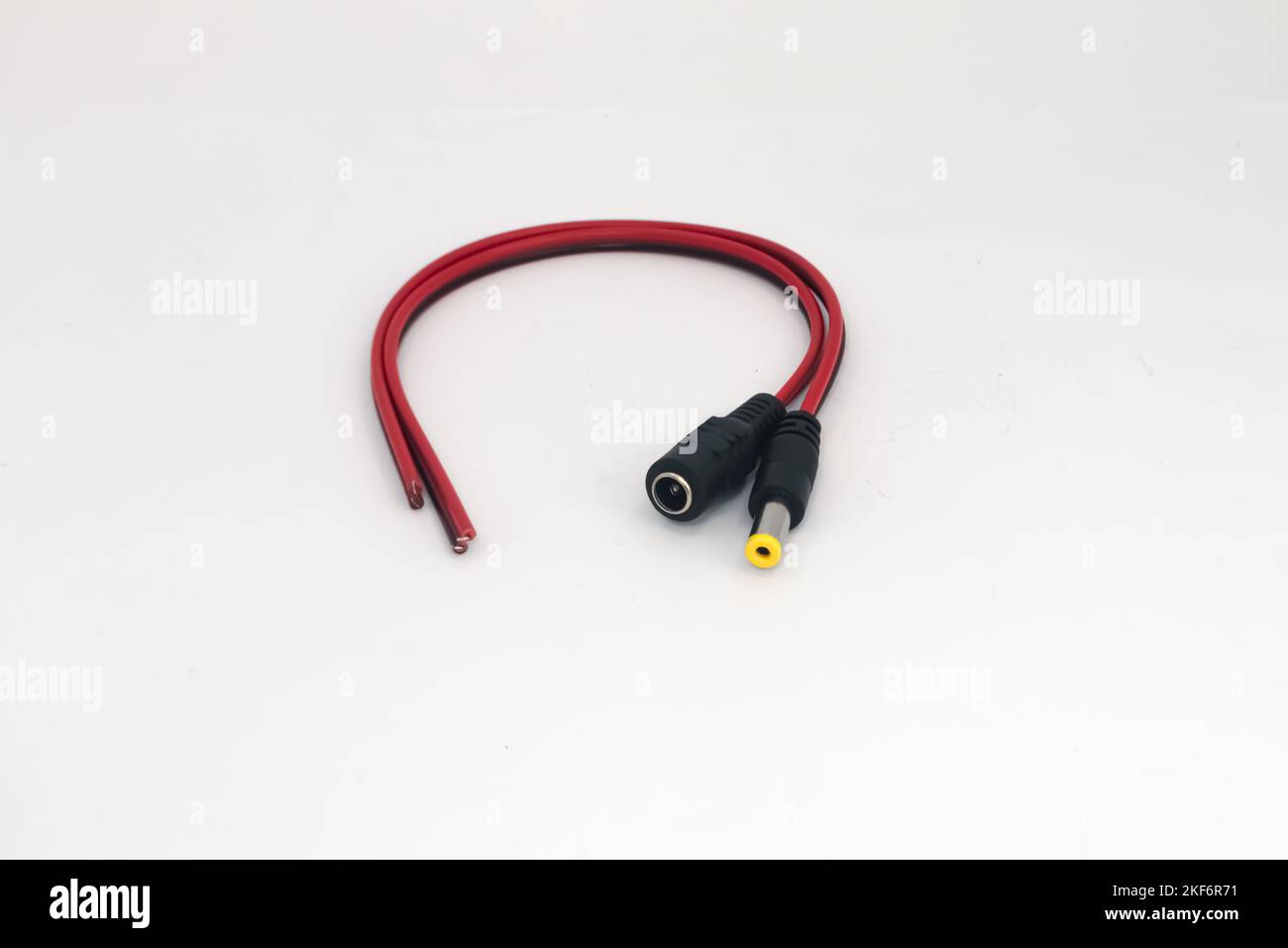 DC 12V male and female connector cables on a white background ...