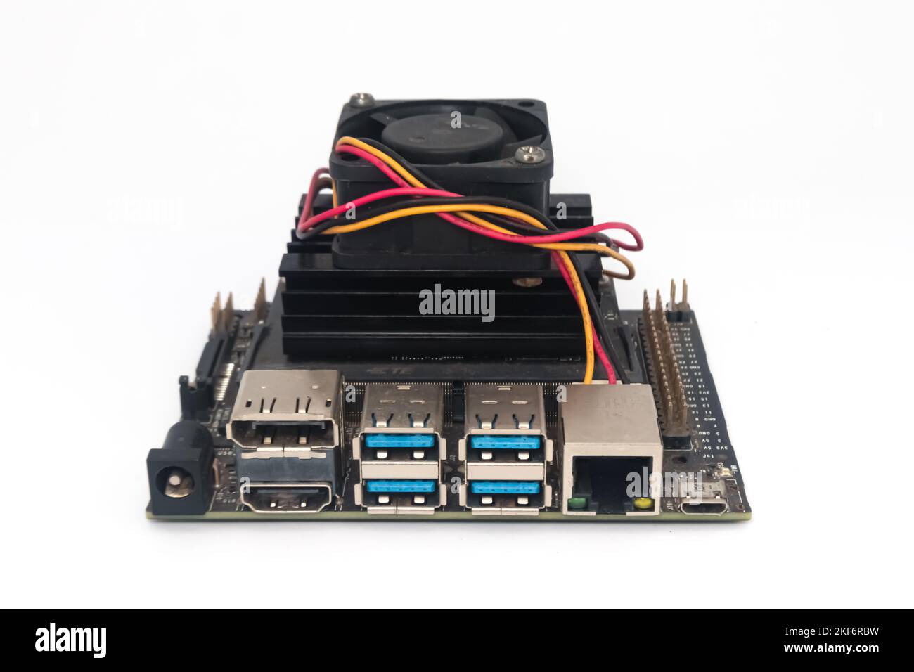 Front view of a mini pc with a dc fan on its GPU on a white background ...