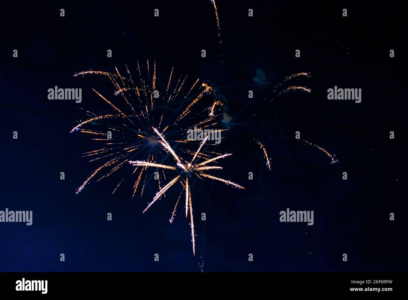 An explosion of bright single fireworks, against the background of the ...