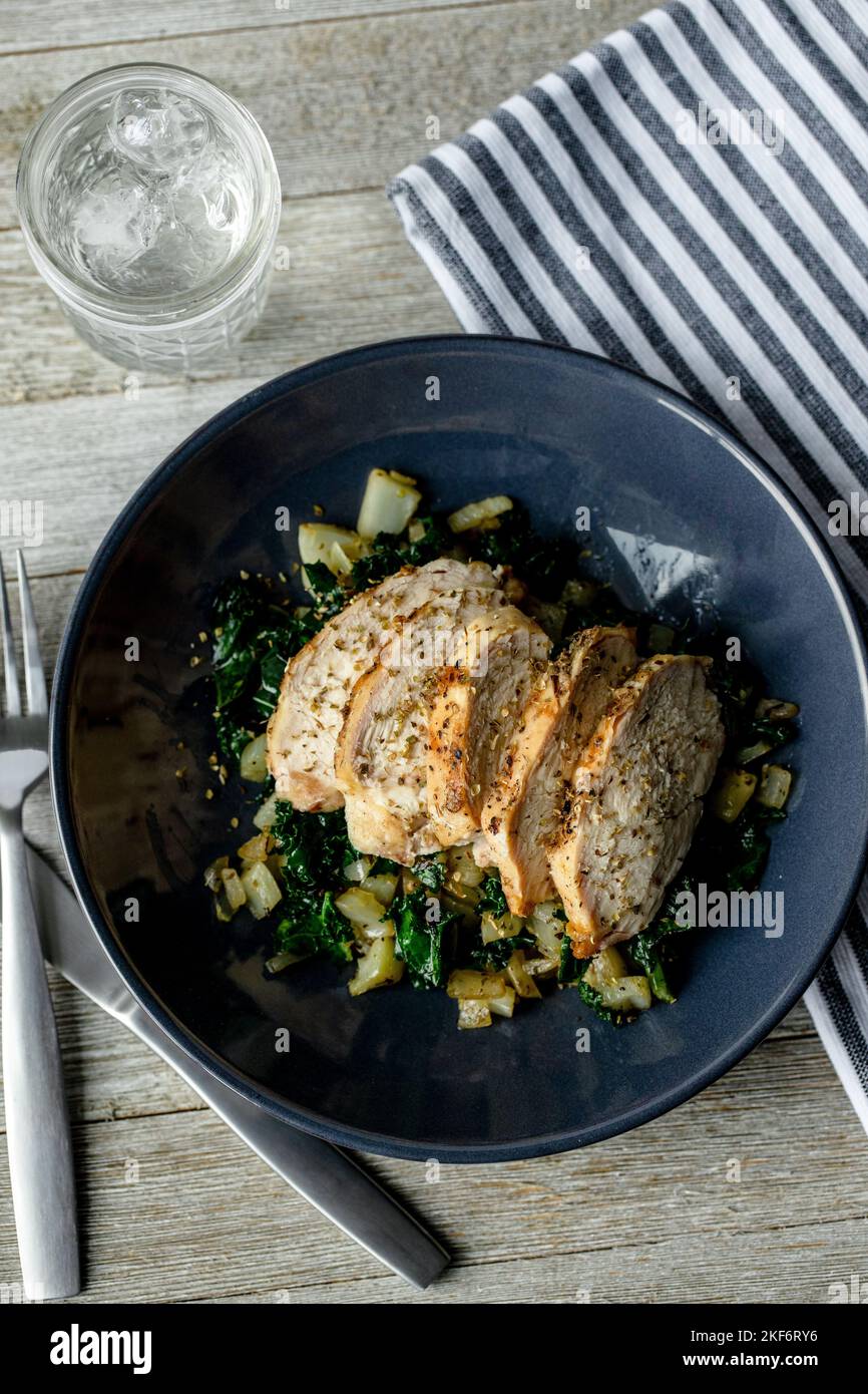 A top view shot of a healthy salad with slices of roasted chicken Stock ...